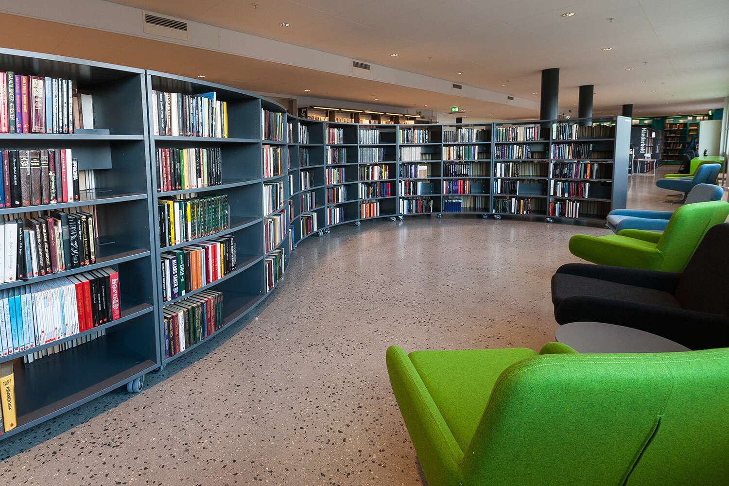 Library Frontline Curve Shelving - Bushell Interiors
